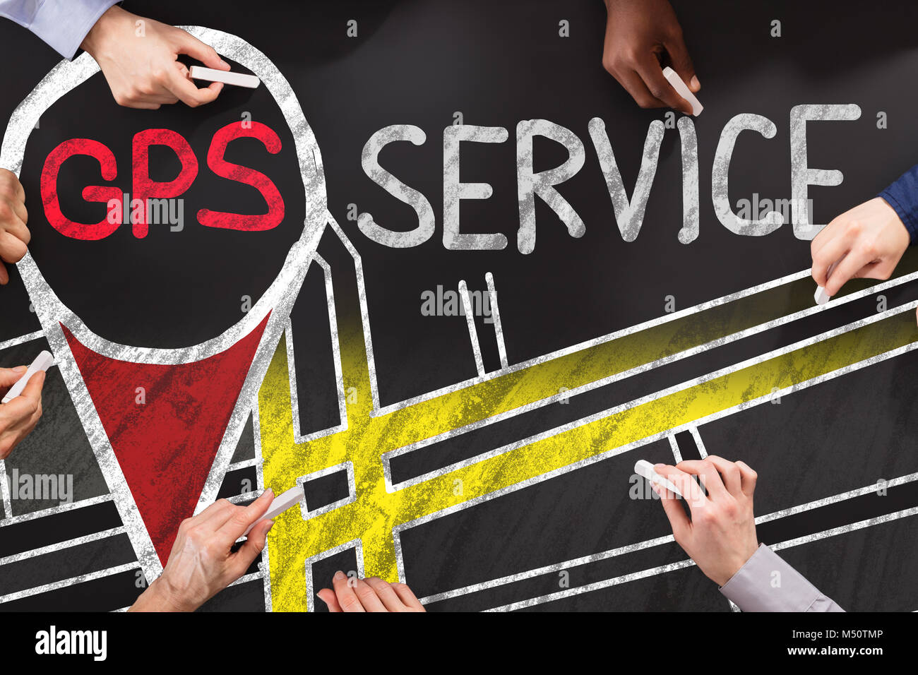 Group Of People Drawing GPS Service Concept Stock Photo - Alamy