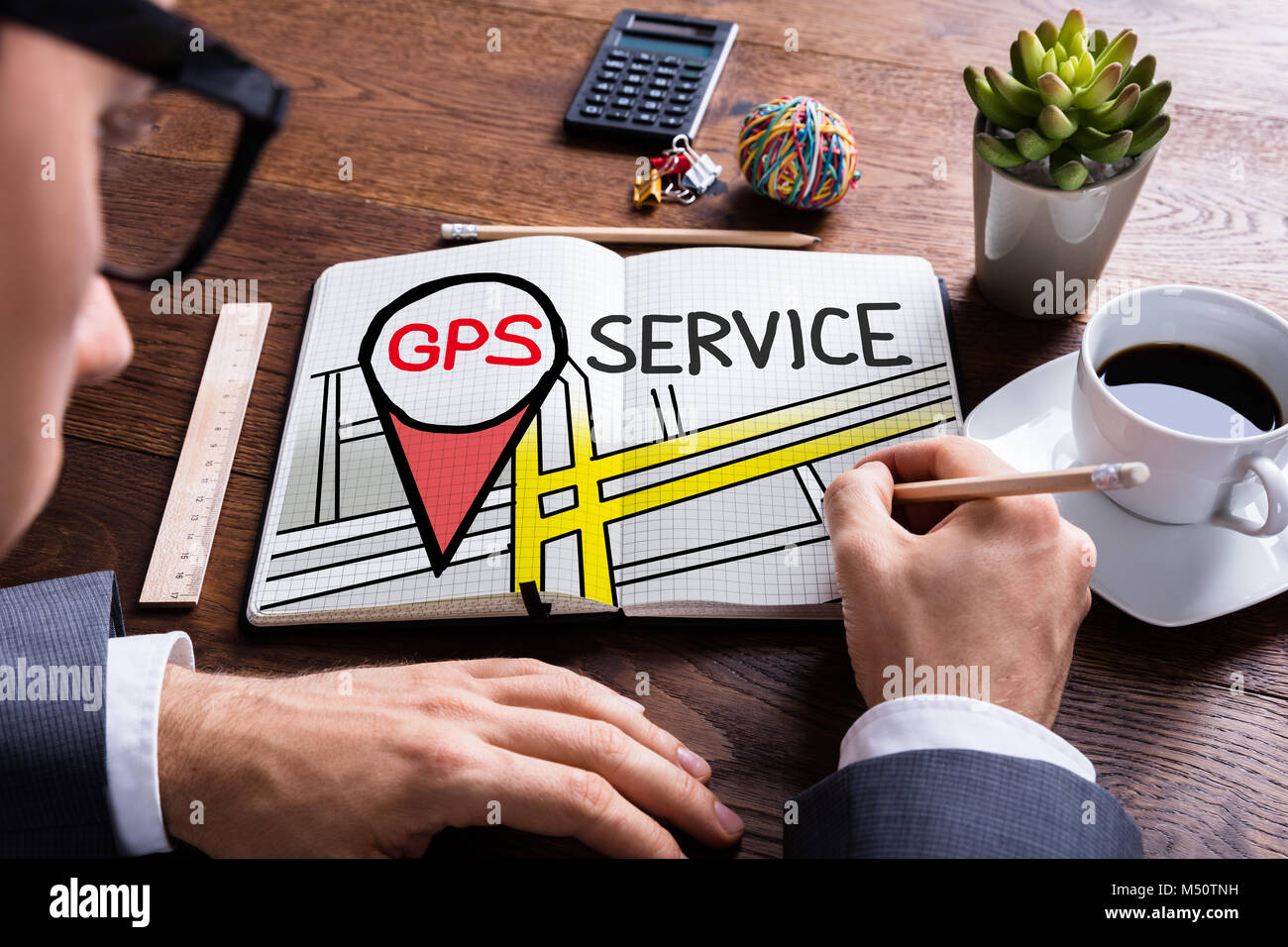 Man Drawing GPS Service Concept In Notepad Stock Photo - Alamy