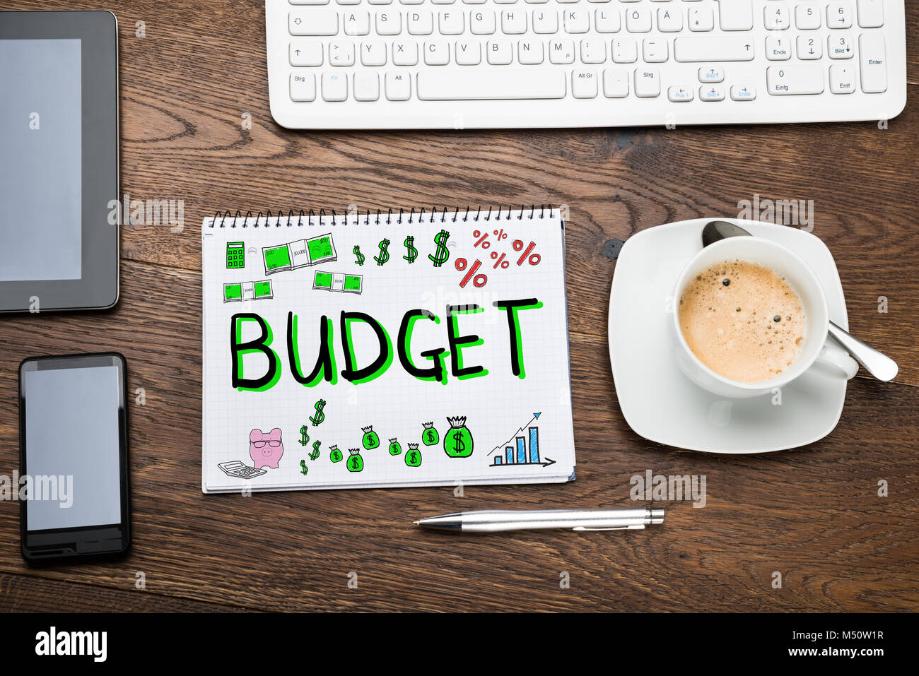 Budget Financial Plan Drawing In Notepad At Desk Stock Photo - Alamy
