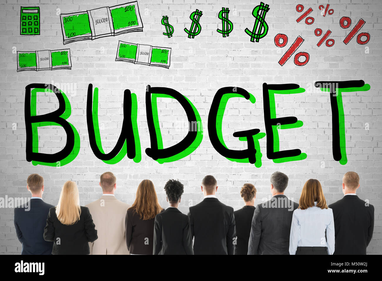 People Looking At Budget Word On Wall Stock Photo - Alamy