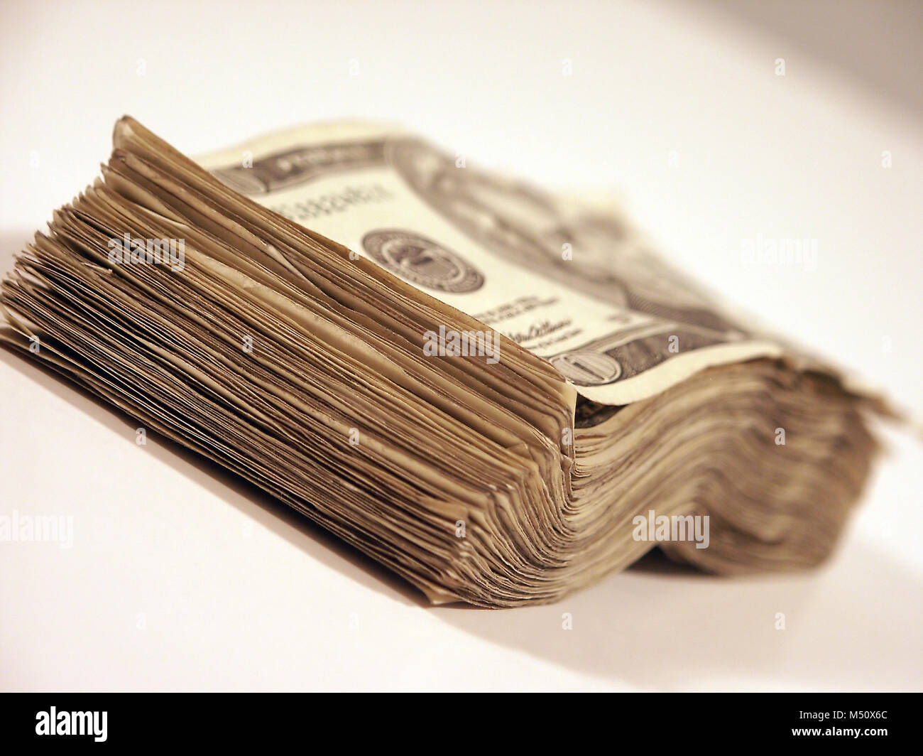 Wad of cash. 20 Dollars banknotes Stock Photo - Alamy