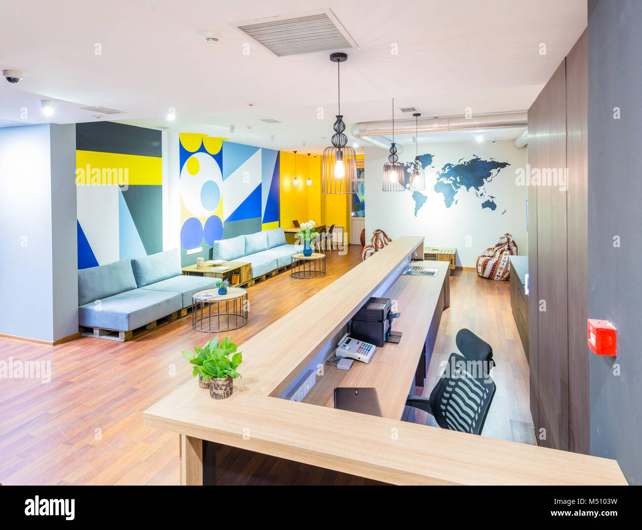 Hotel reception of hostel dormitory Stock Photo - Alamy