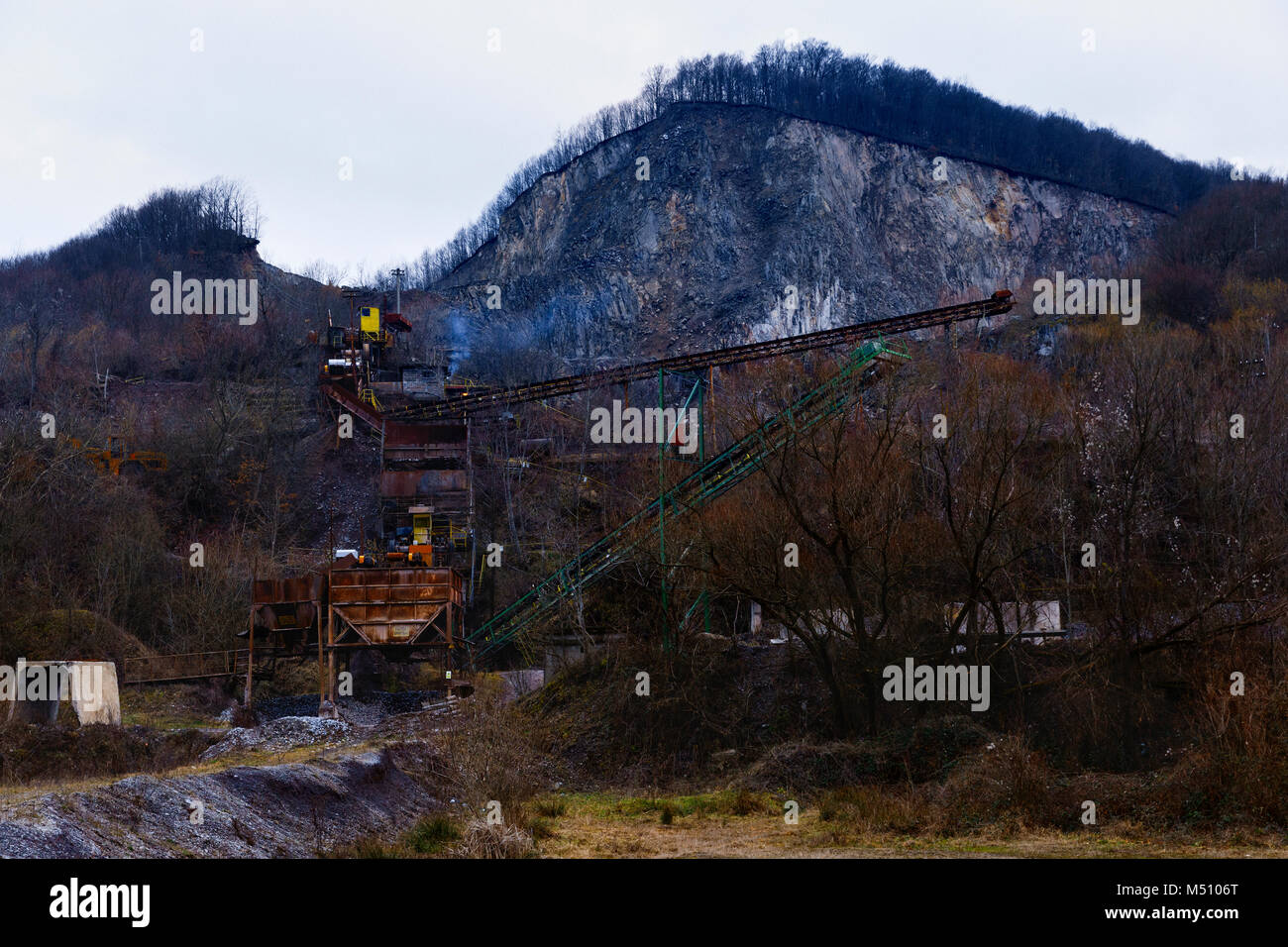 old machine by the exploitation of the stone quarry Stock Photo - Alamy