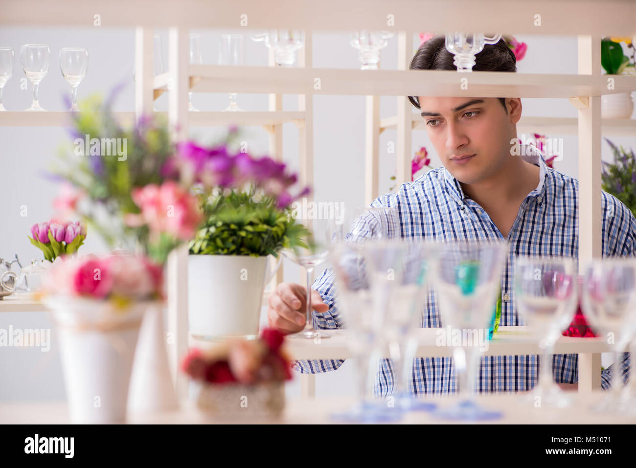 Young handsome man shopping in shop Stock Photo - Alamy