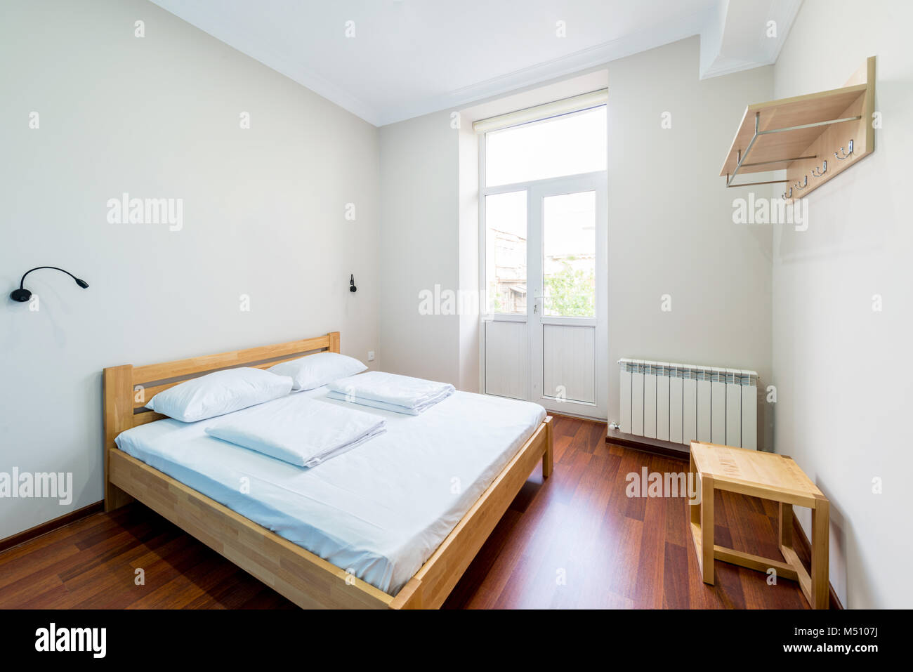 Double bed in the hotel Stock Photo - Alamy