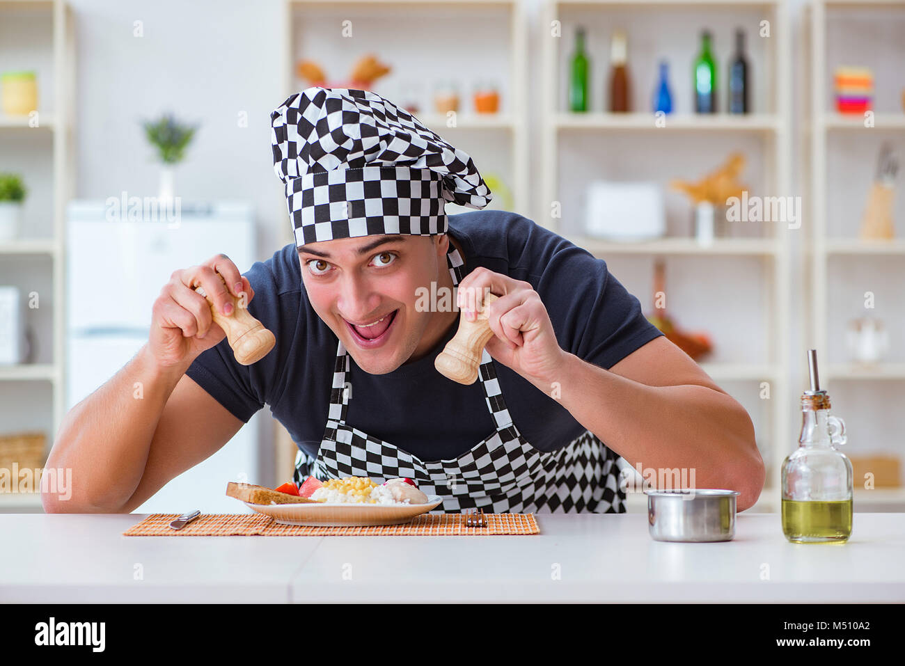 Chef cook cooking a meal breakfast dinner in the kitchen Stock Photo ...