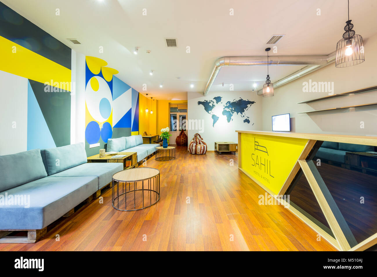 Hotel reception of hostel dormitory Stock Photo - Alamy