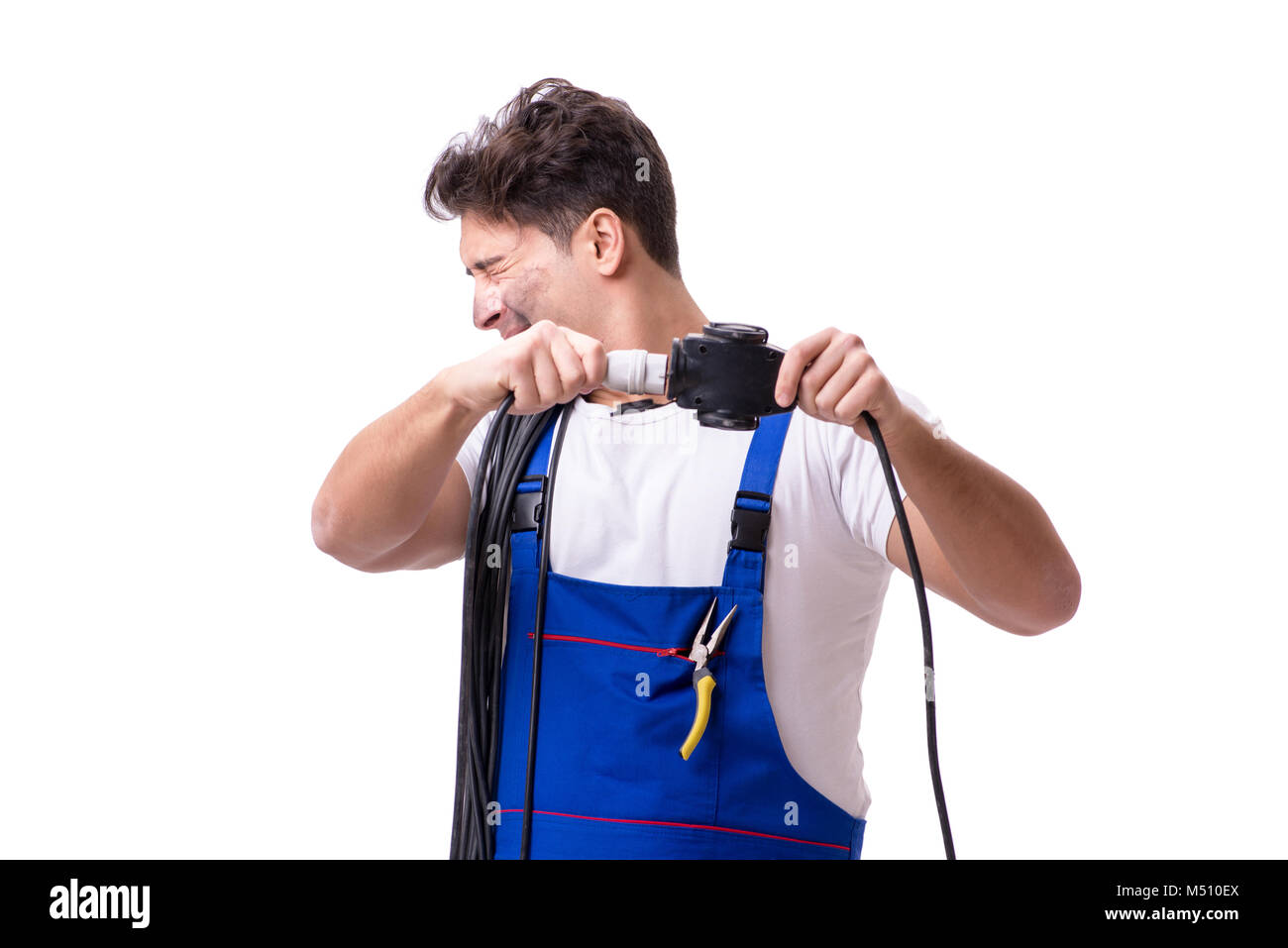 Funny man doing electrical repair Stock Photo - Alamy