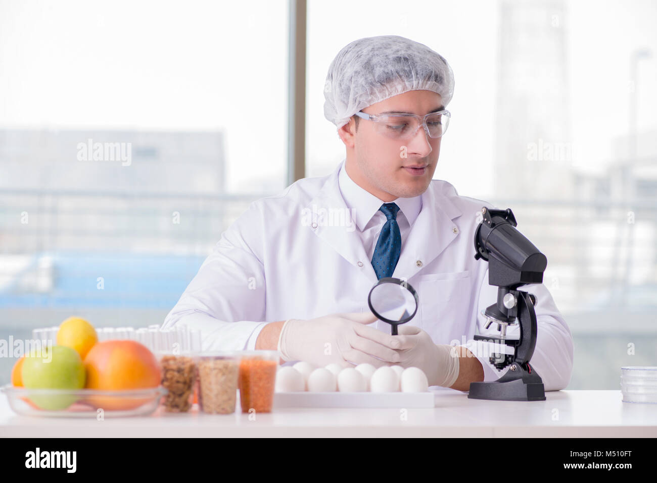 Nutrition expert testing food products in lab Stock Photo - Alamy