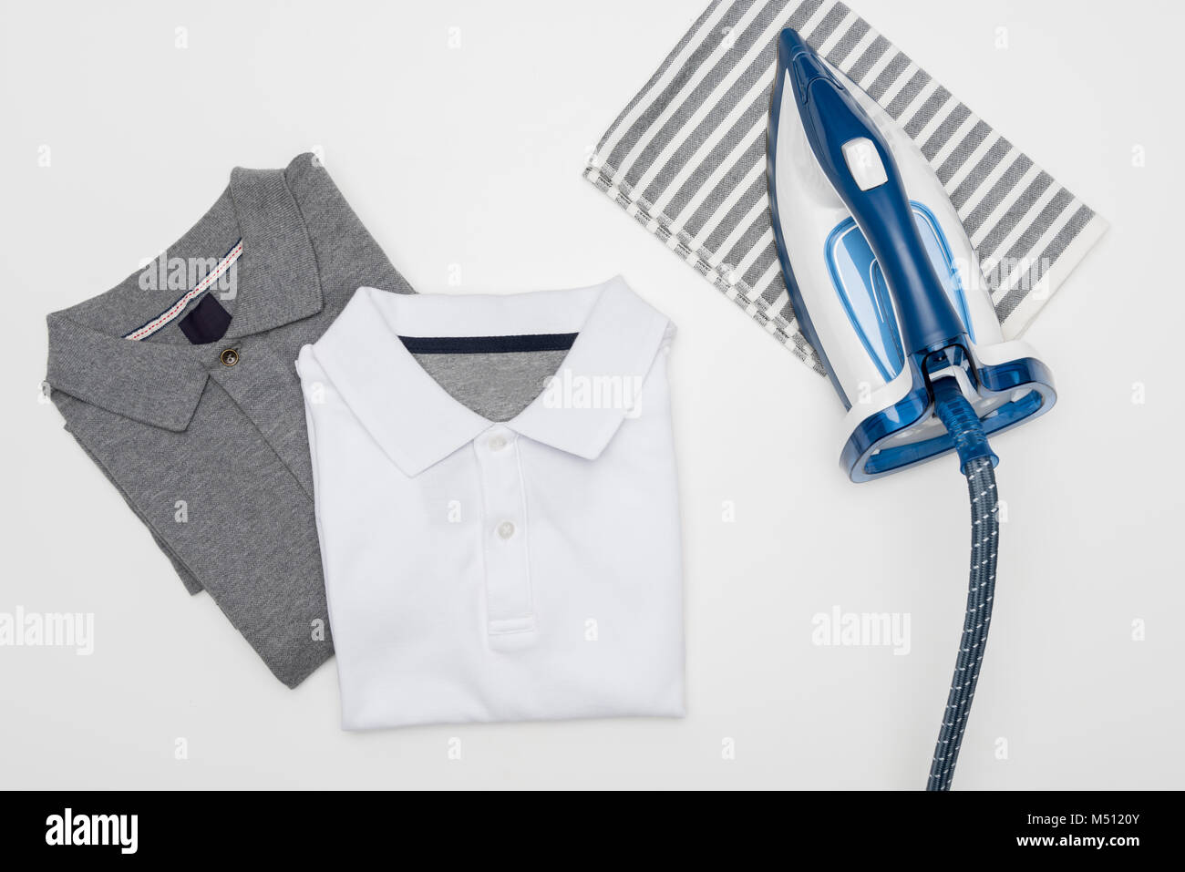 electric iron and textile Stock Photo - Alamy