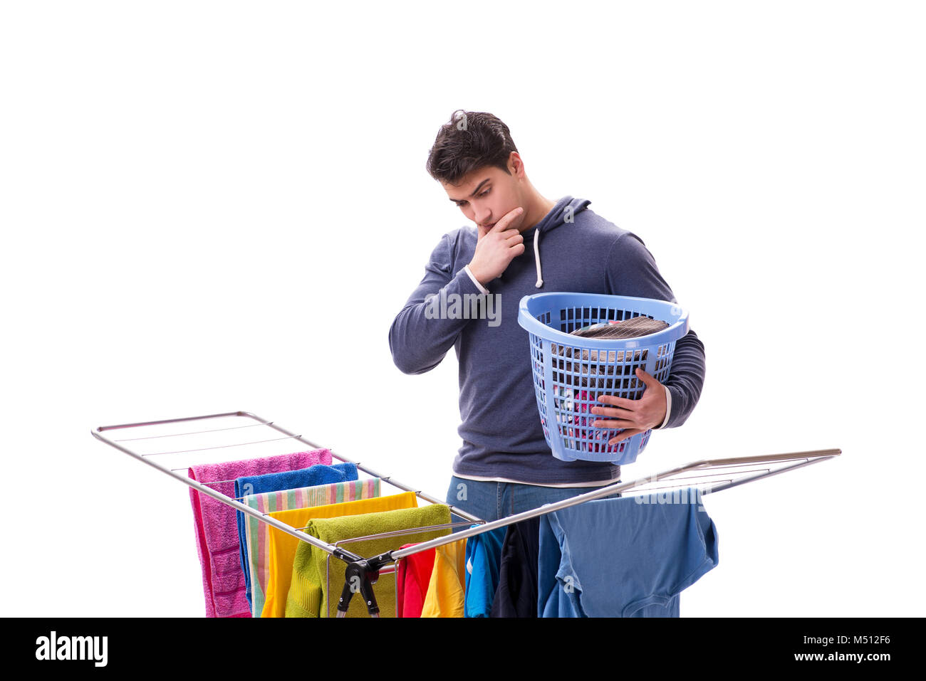 Husband man doing laundry isolated on white Stock Photo - Alamy