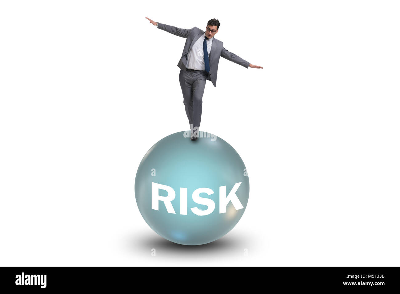 Young businessman in business risk and uncertainty concept Stock Photo ...