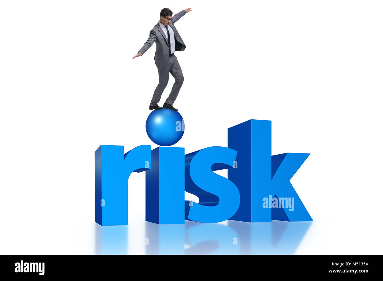 Young businessman in business risk and uncertainty concept Stock Photo ...