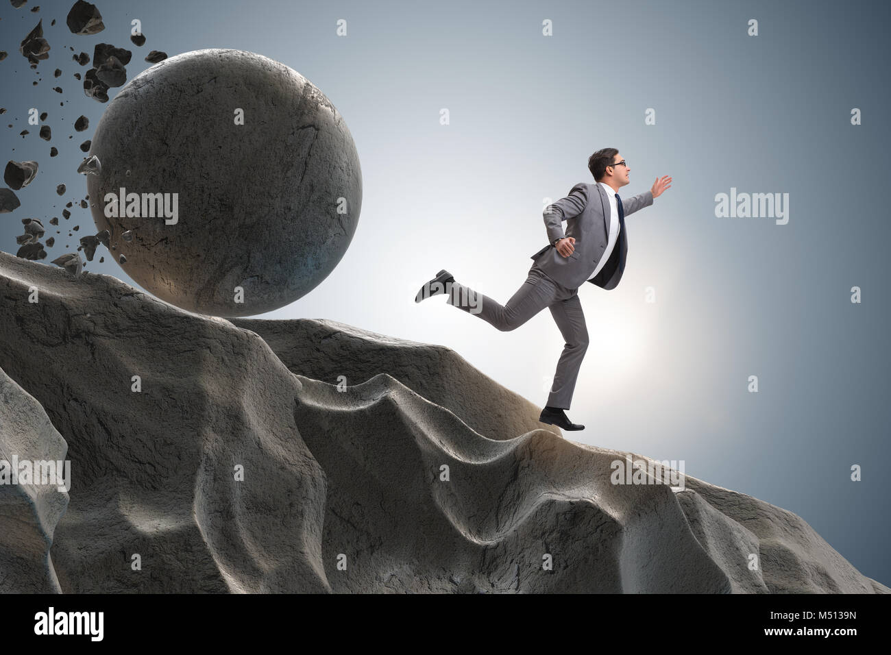 Businessman falling down mountain hi-res stock photography and images ...