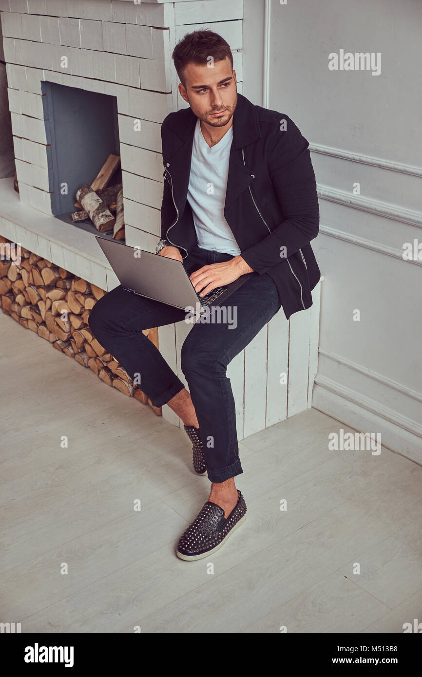 Portrait of a handsome male in a stylish clothing Stock Photo - Alamy
