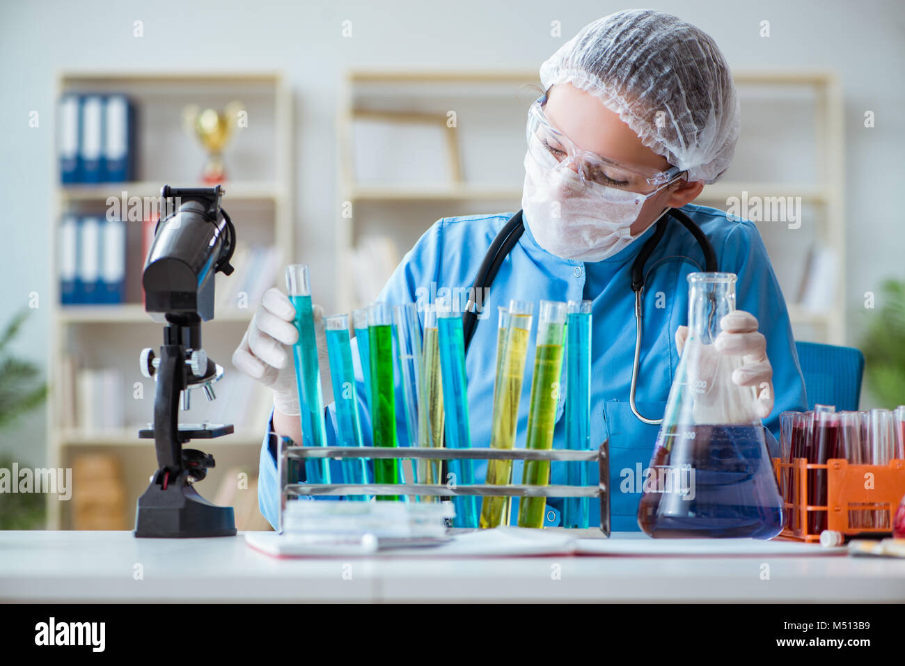 Female scientist researcher doing experiments in laboratory Stock Photo ...