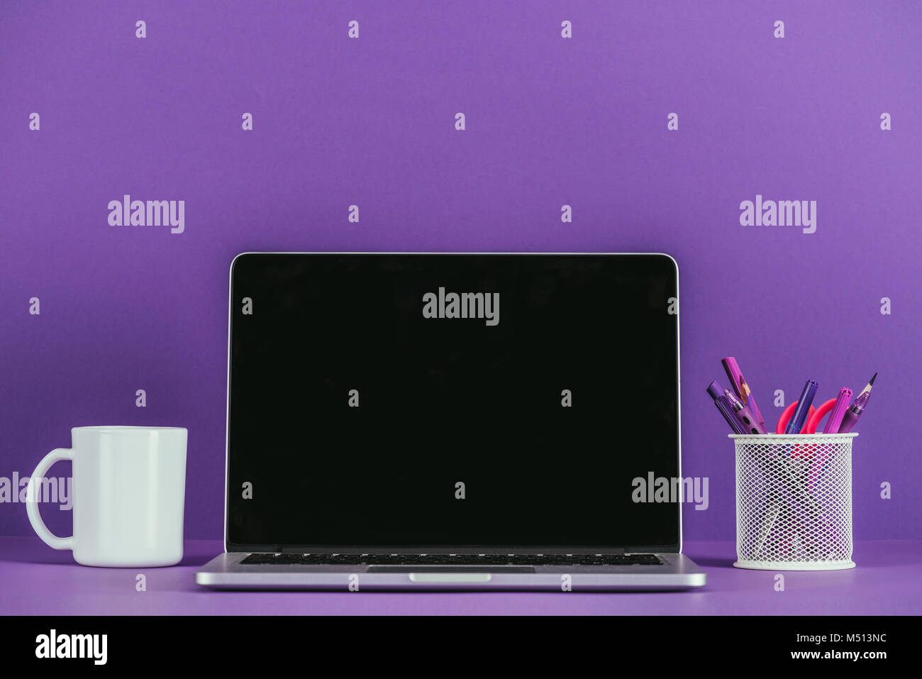 Purple laptop hi-res stock photography and images - Alamy