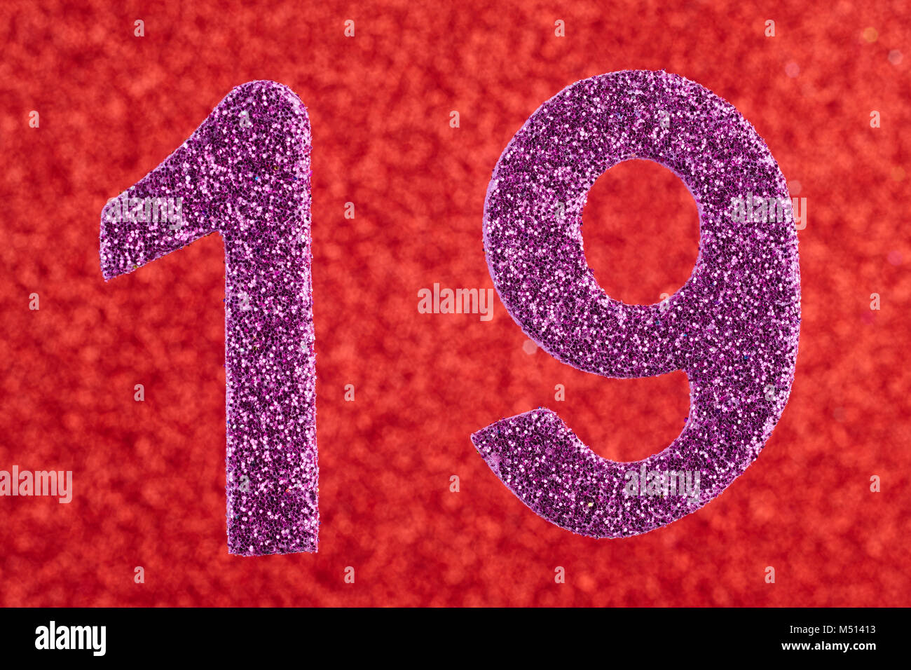 Number nineteen purple color over a red background. Anniversary ...