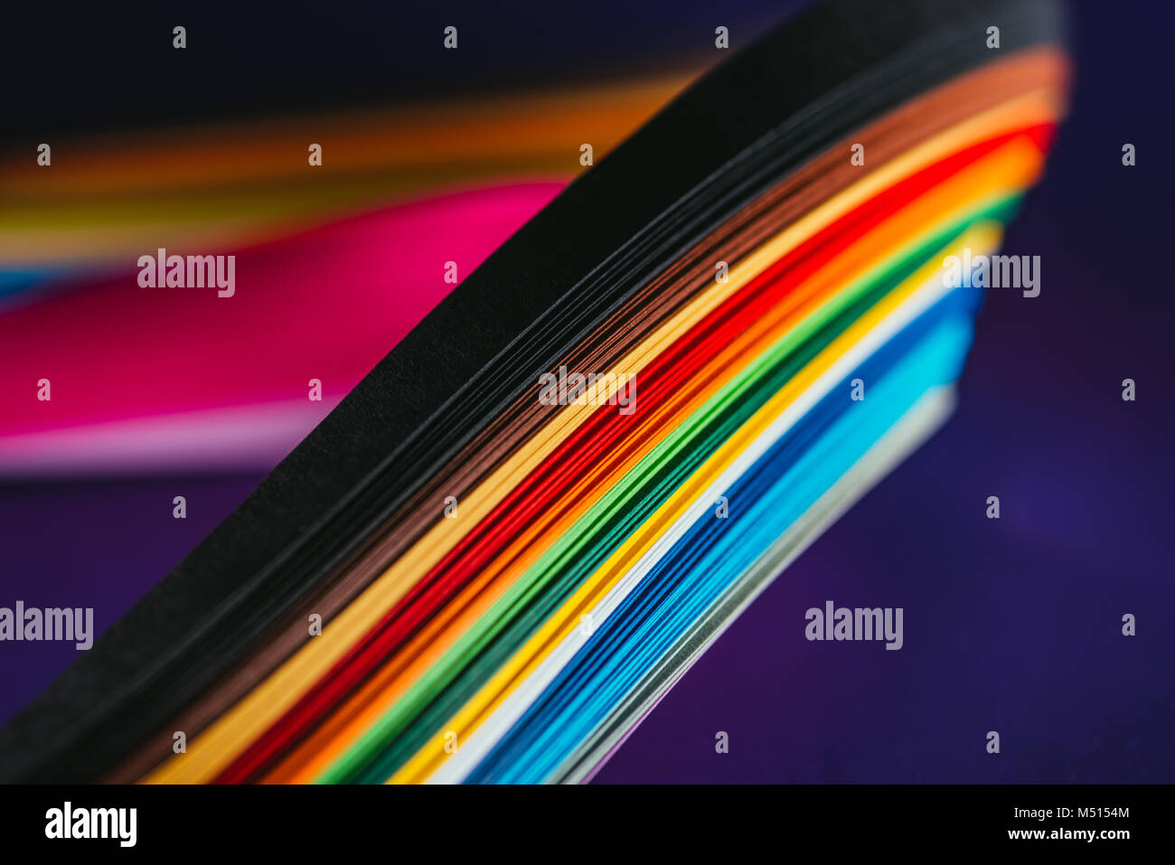 colored bright quilling paper curves on purple Stock Photo - Alamy