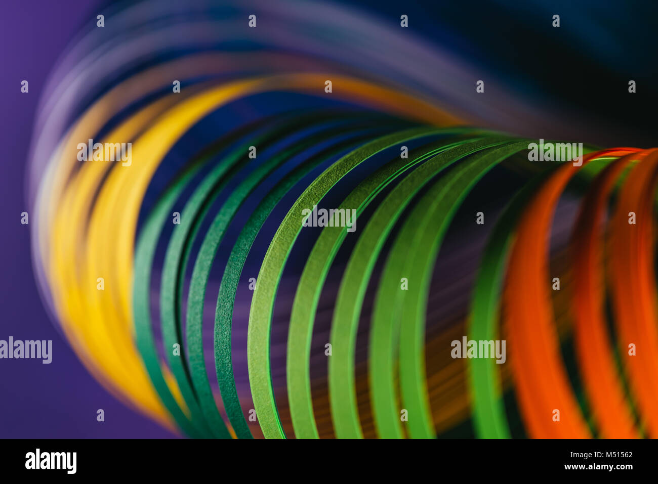 close up of colored quilling paper curves on purple Stock Photo - Alamy
