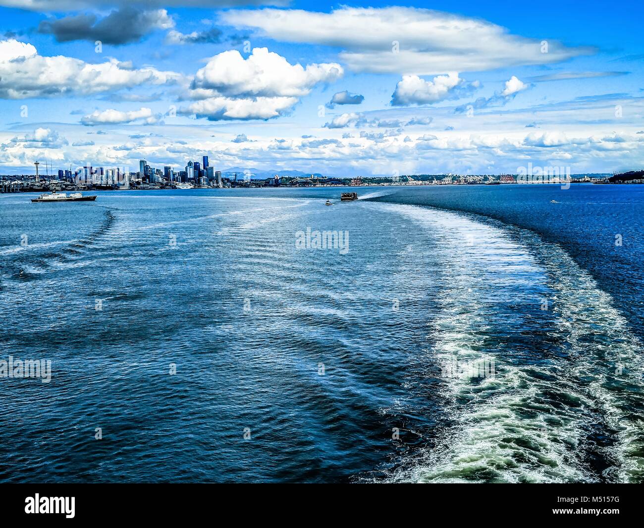 SEATTLE WASHINGTON CITYSCAPE SKYLINE ON PARTLY CLOUDY DAY Stock Photo ...