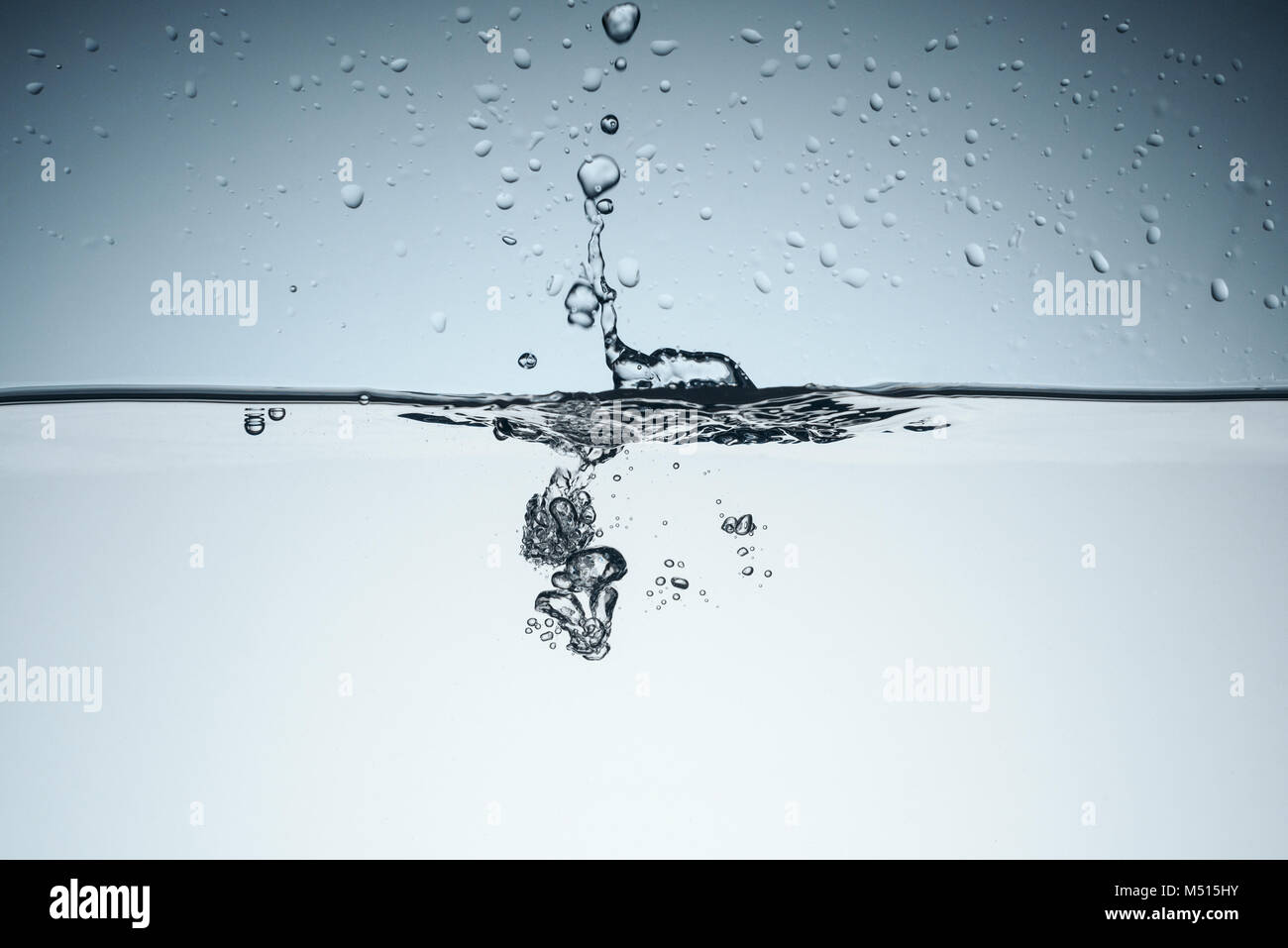 minimalistic background with water splash and bubbles, isolated on ...