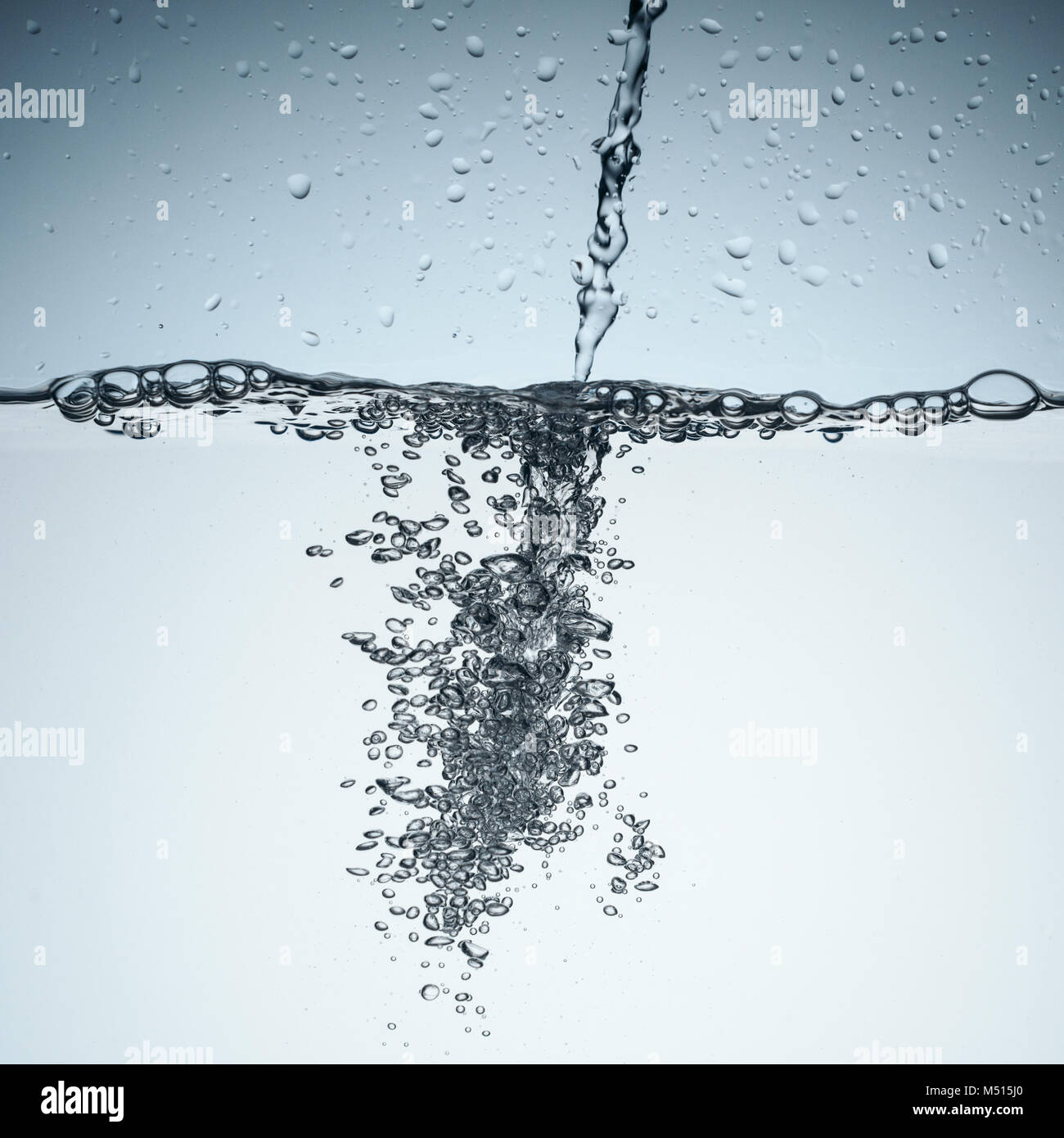 background with pouring water with bubbles, isolated on white Stock ...