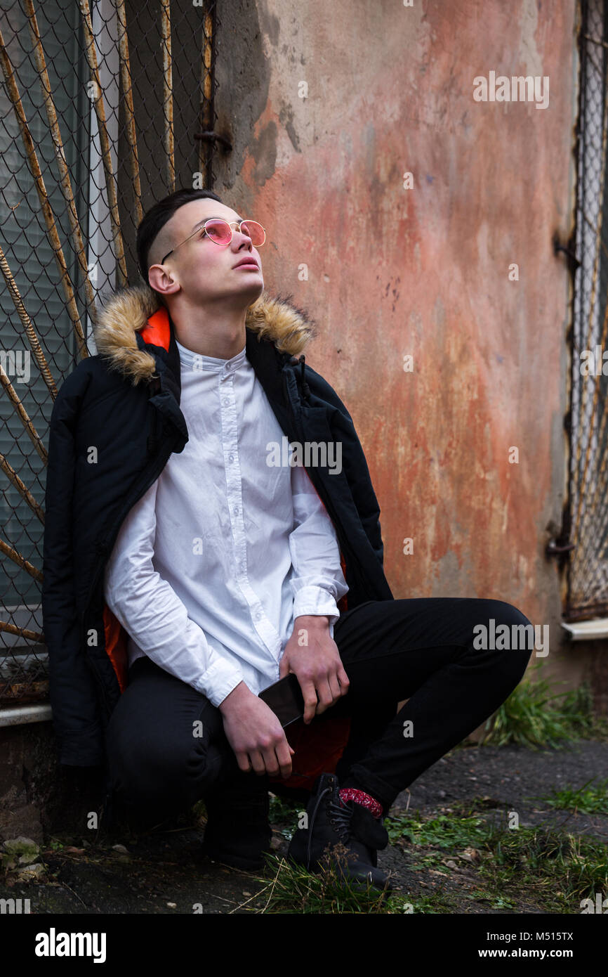 Sad guy with a smartphone Stock Photo - Alamy