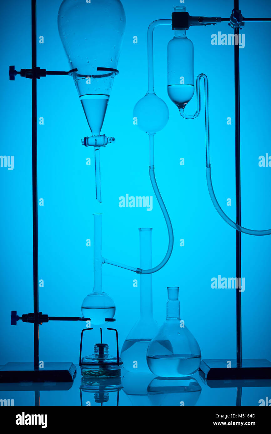scientific analysis in modern laboratory on blue Stock Photo - Alamy