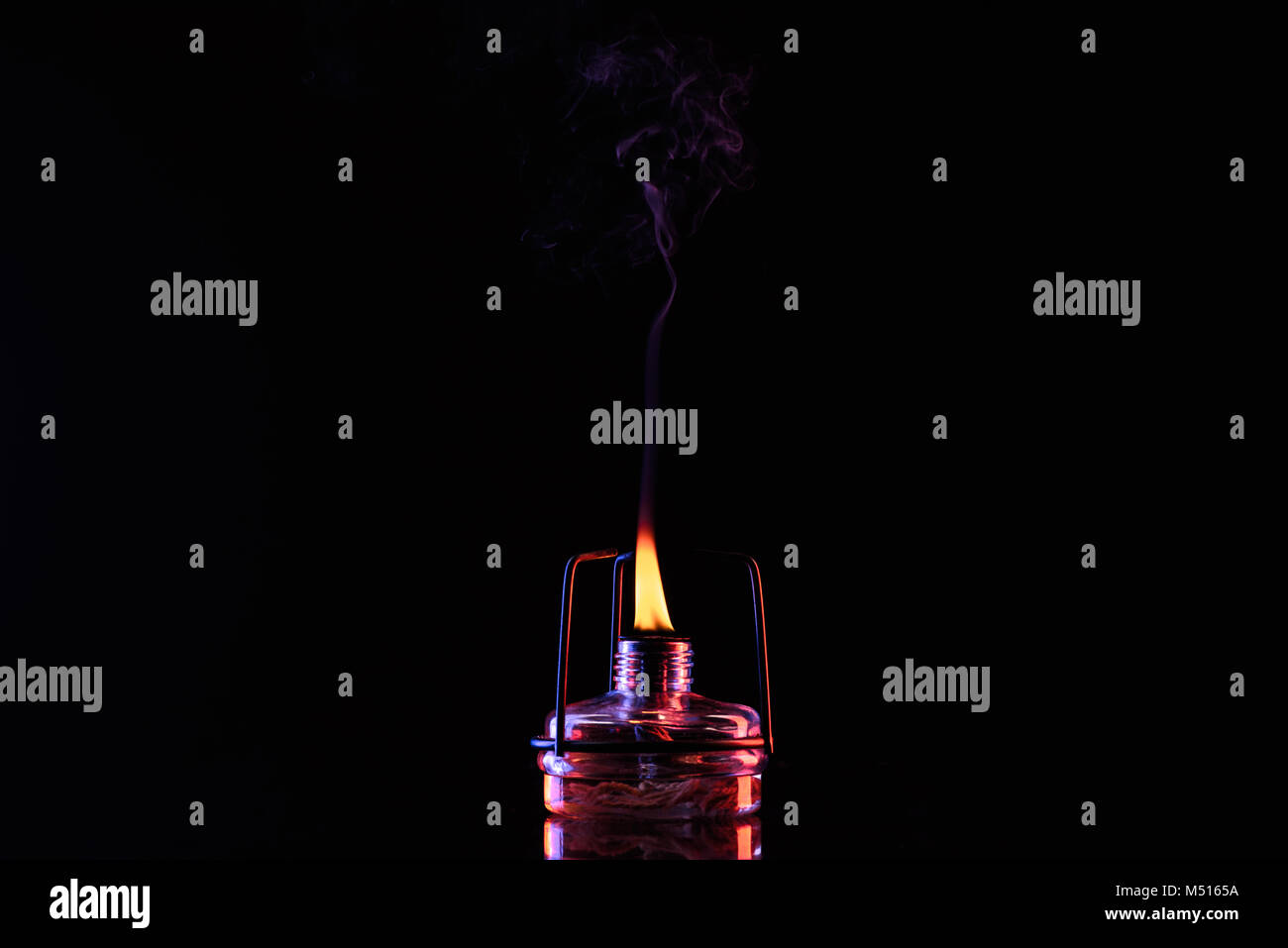 smoke from fire in chemical laboratory on black Stock Photo - Alamy