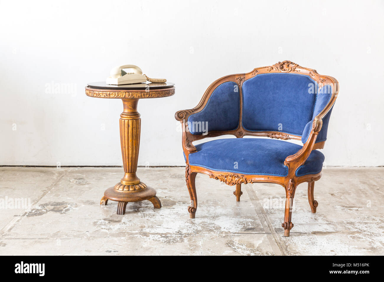 Blue sofa couch with phone Stock Photo - Alamy