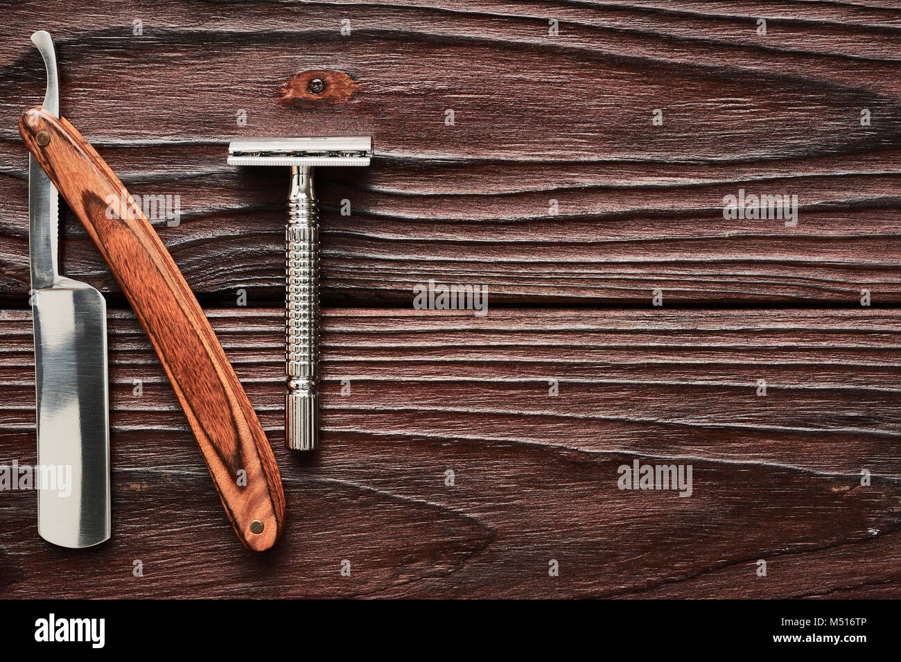Vintage barber shop razor tools on wooden background Stock Photo - Alamy