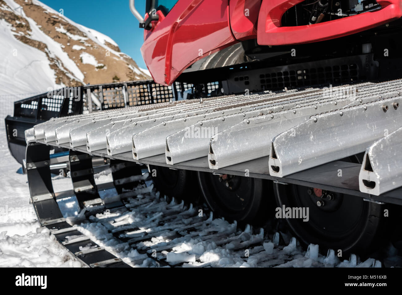 Snow grooming machine (Ratrak). Winter mountain landscape Stock Photo ...