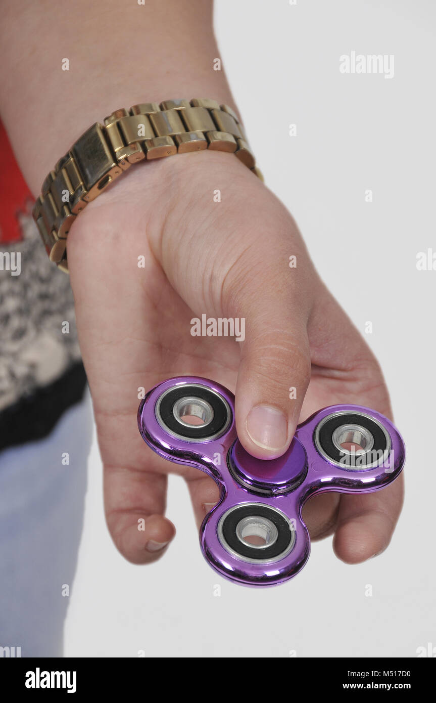 Autism girl fidget spinner hi-res stock photography and images - Alamy