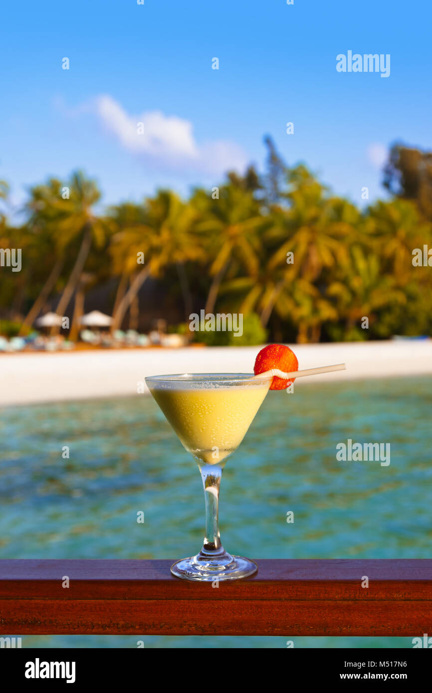 Fruit cocktail on Maldives beach Stock Photo - Alamy