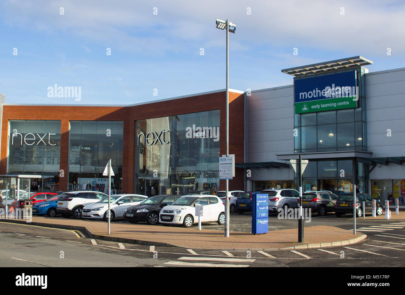 Various retail shop fronts at the modern Bloomfield Shopping Centre in ...