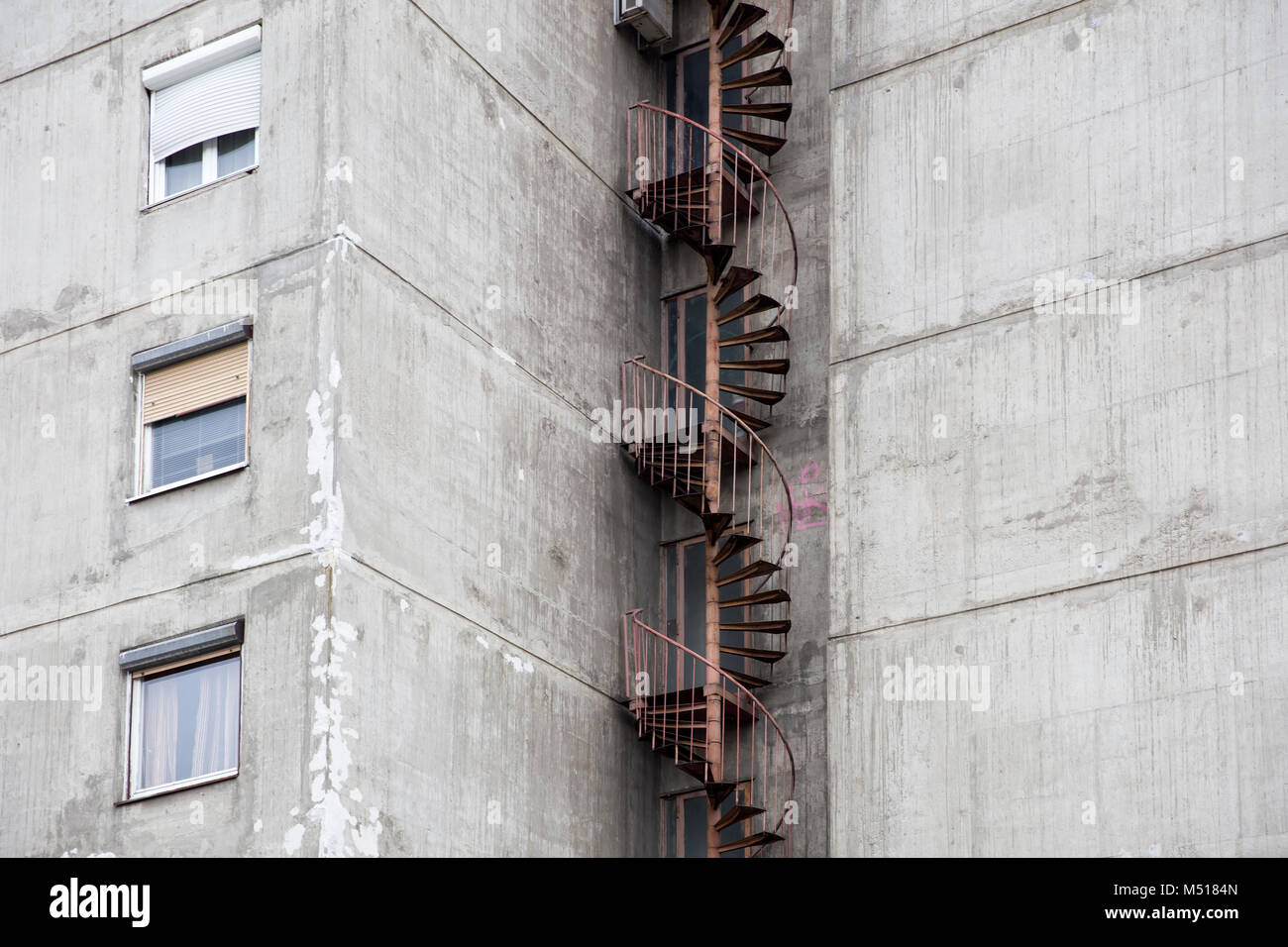 Closeup detail of the fire escape at concrete urban building Stock ...
