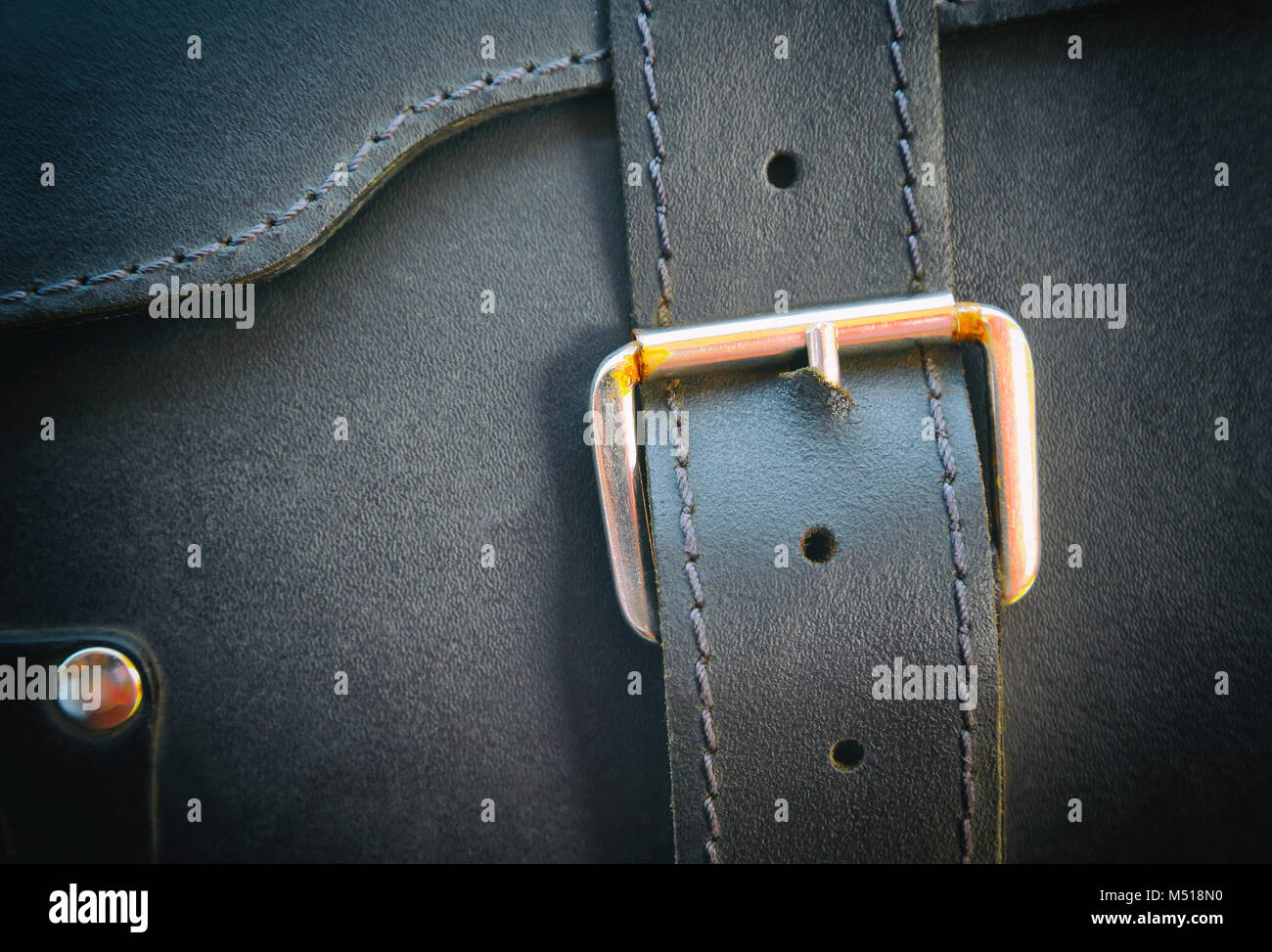 black briefcase with buckle Stock Photo - Alamy