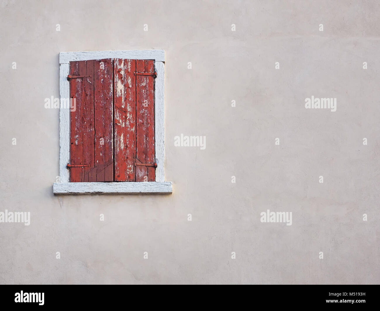 Window with red window shutter of a light painted house Stock Photo - Alamy