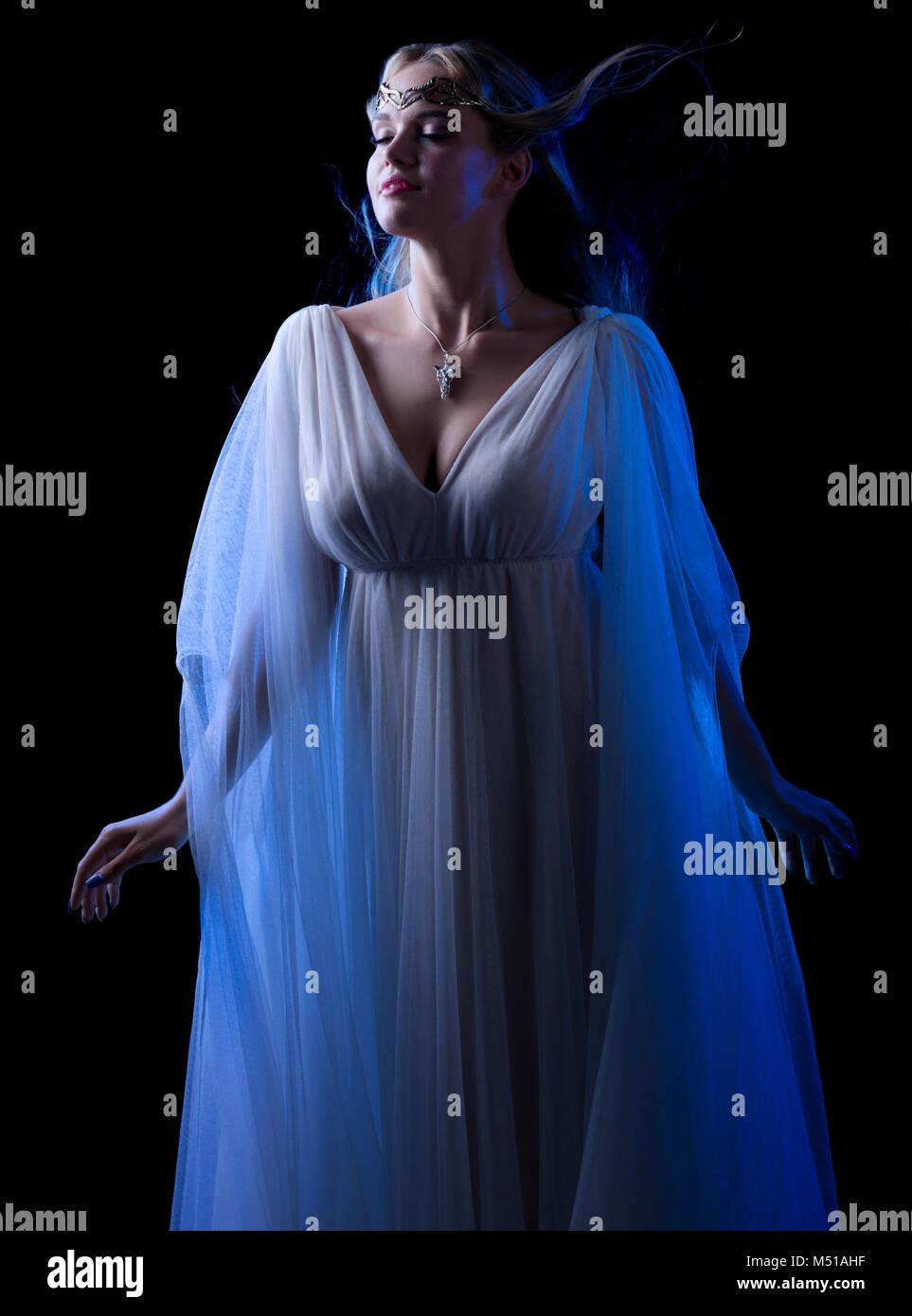 Young elven woman isolated on black Stock Photo - Alamy
