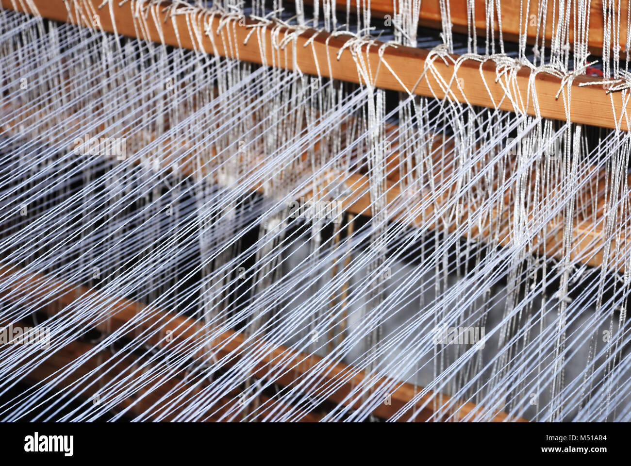 Hand spinning loom hi-res stock photography and images - Alamy