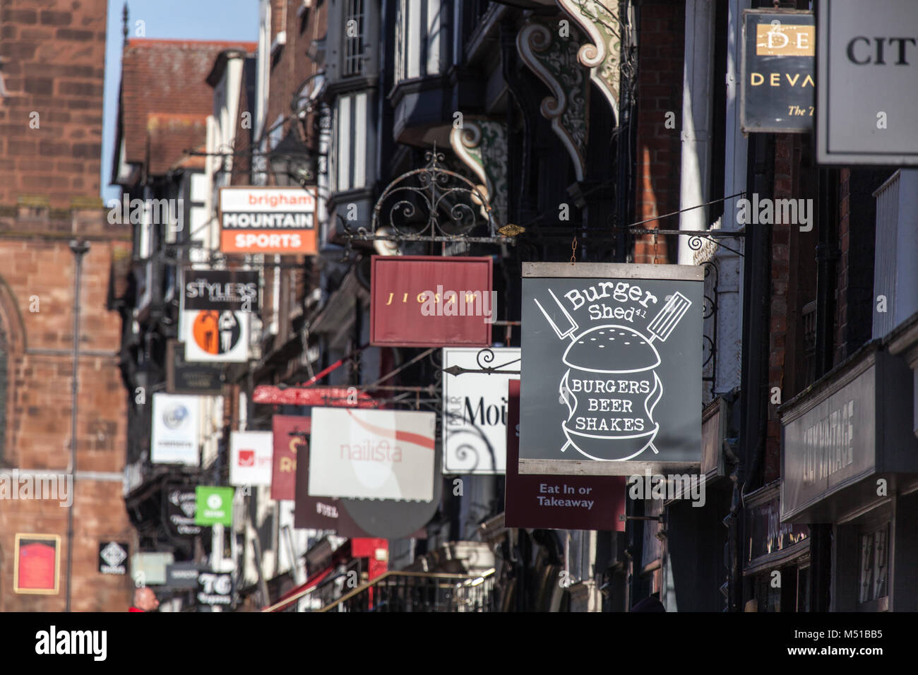 City of Chester, England. Picturesque view of shop signs on Chester’s ...