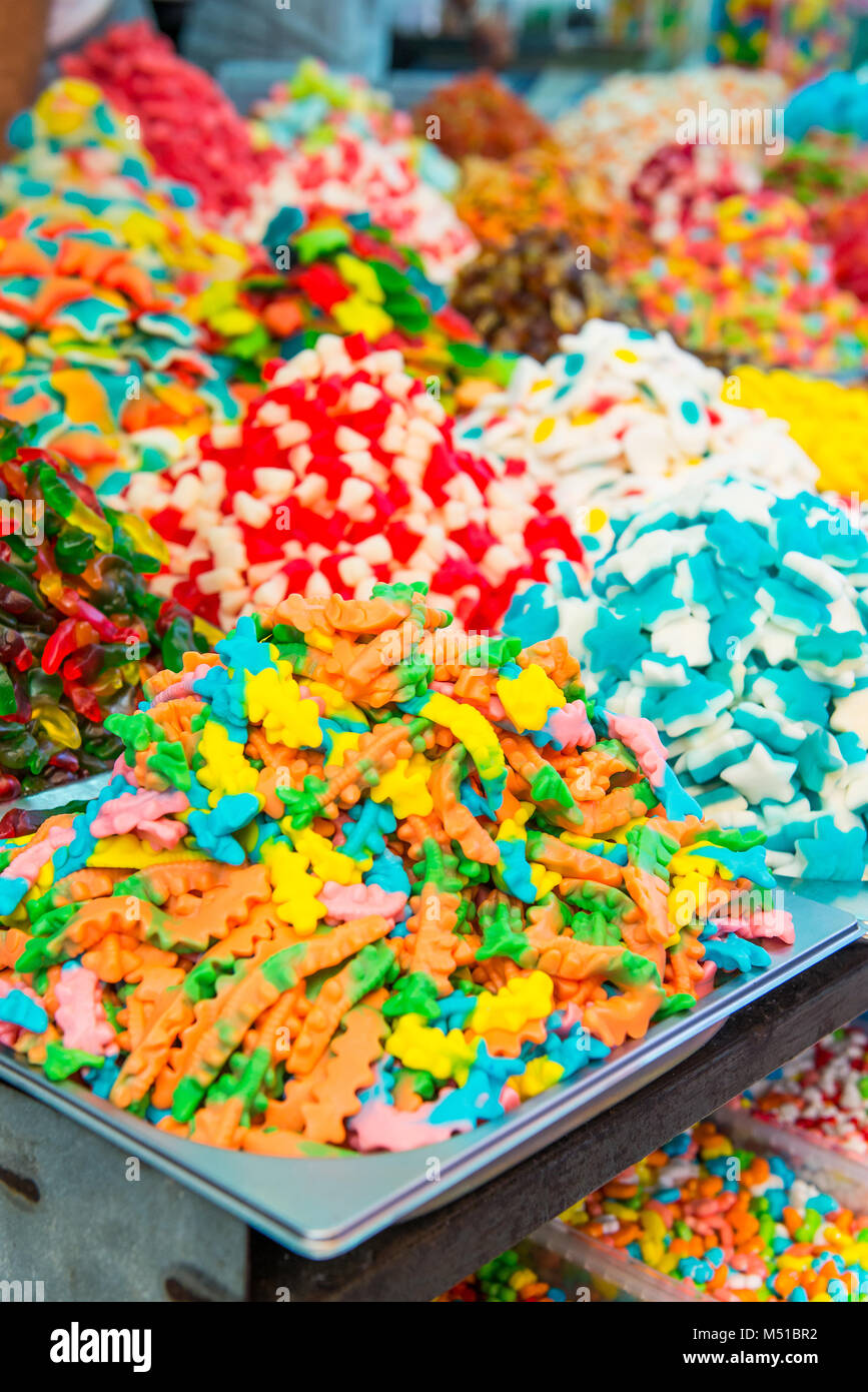 Close up view of assorted colorful different shape jelly candies on ...
