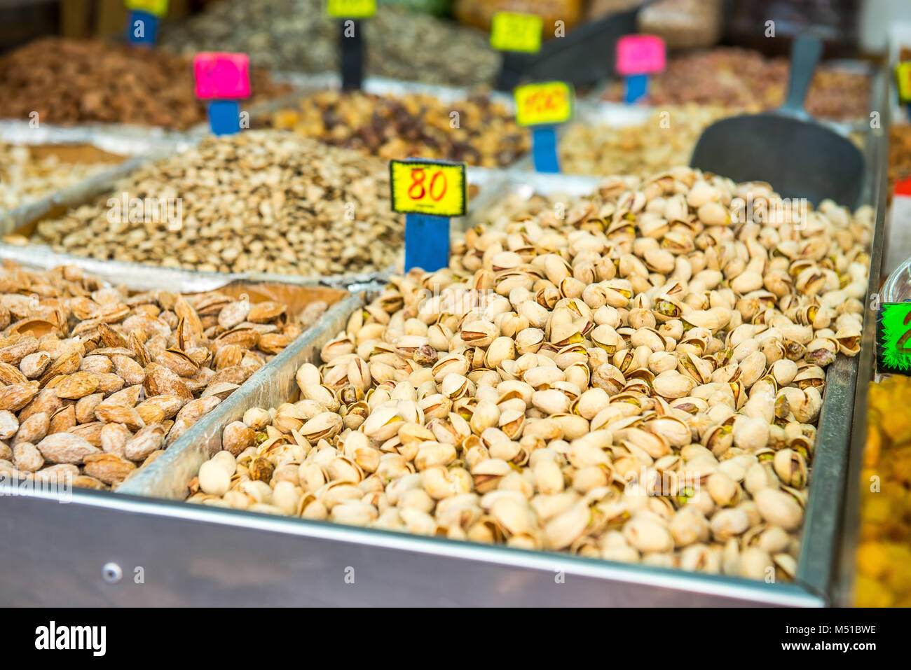 Close up different nuts with prices on the market place in Tel Aviv ...