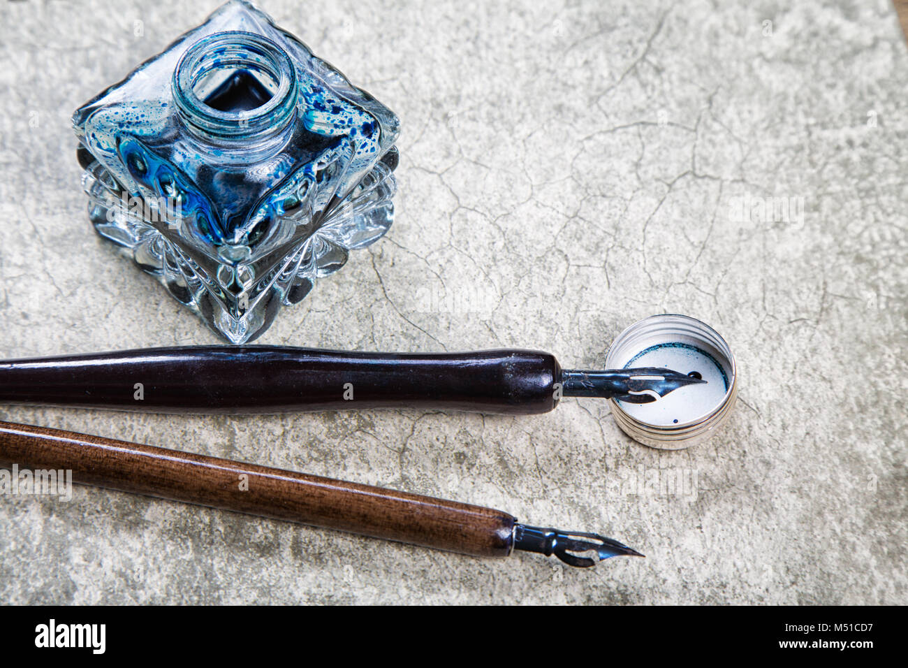 vintage fountain pens and ink on a retro background Stock Photo - Alamy