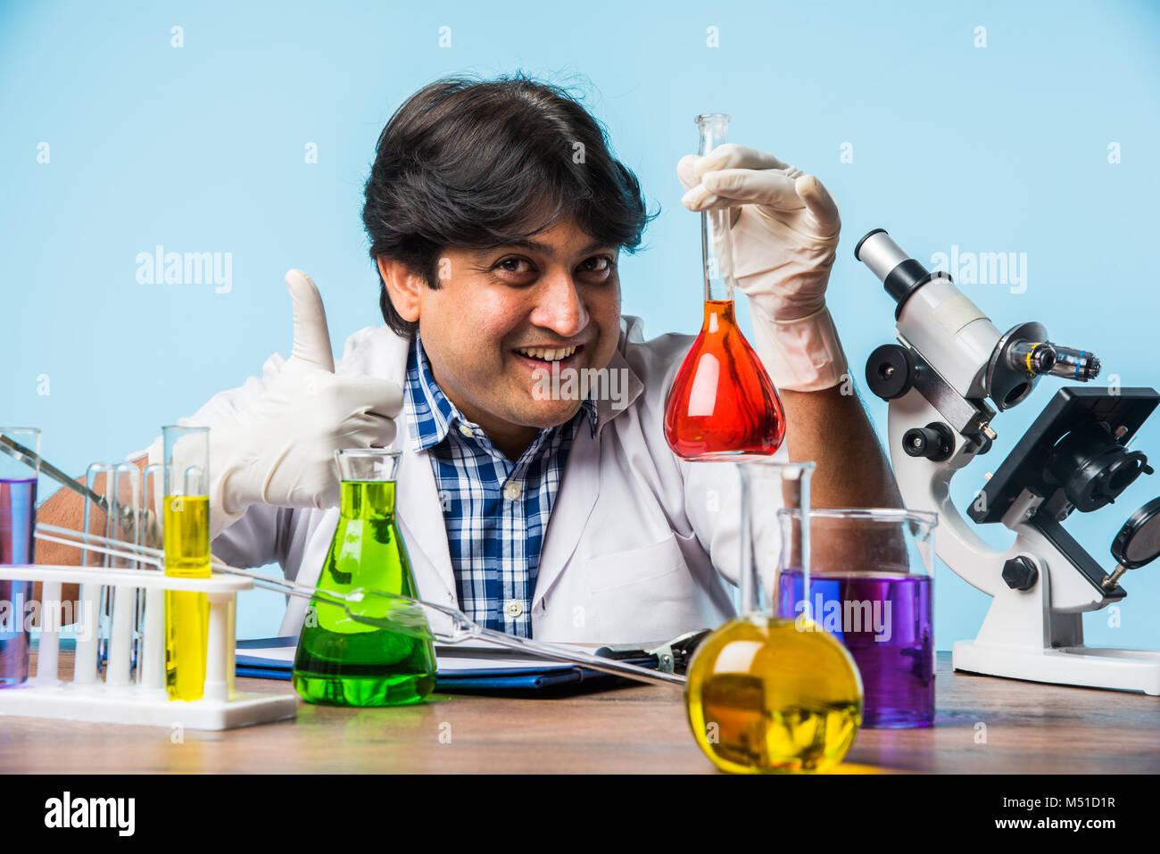 Indian Doctor With Microscope High Resolution Stock Photography and ...