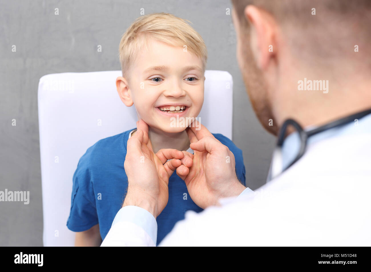Child with doctor. The pediatrician examines the child Stock Photo - Alamy