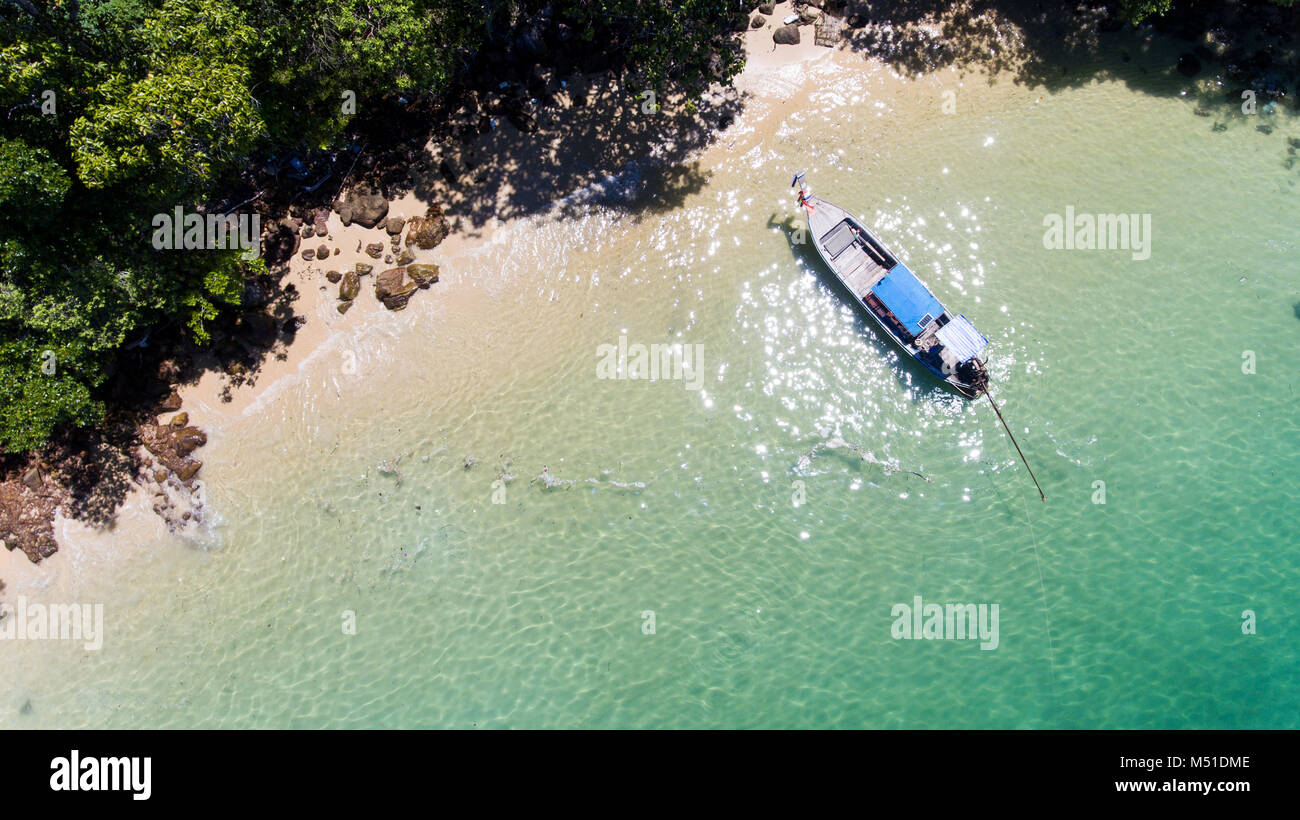 Top view of wooden boat and blue sea of the Andama sea island photo ...
