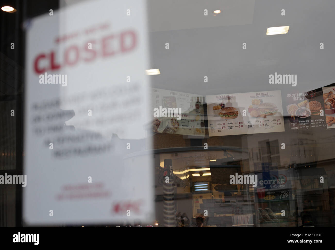 A closed sign on the door of a KFC restaurant in Clapham, south London ...