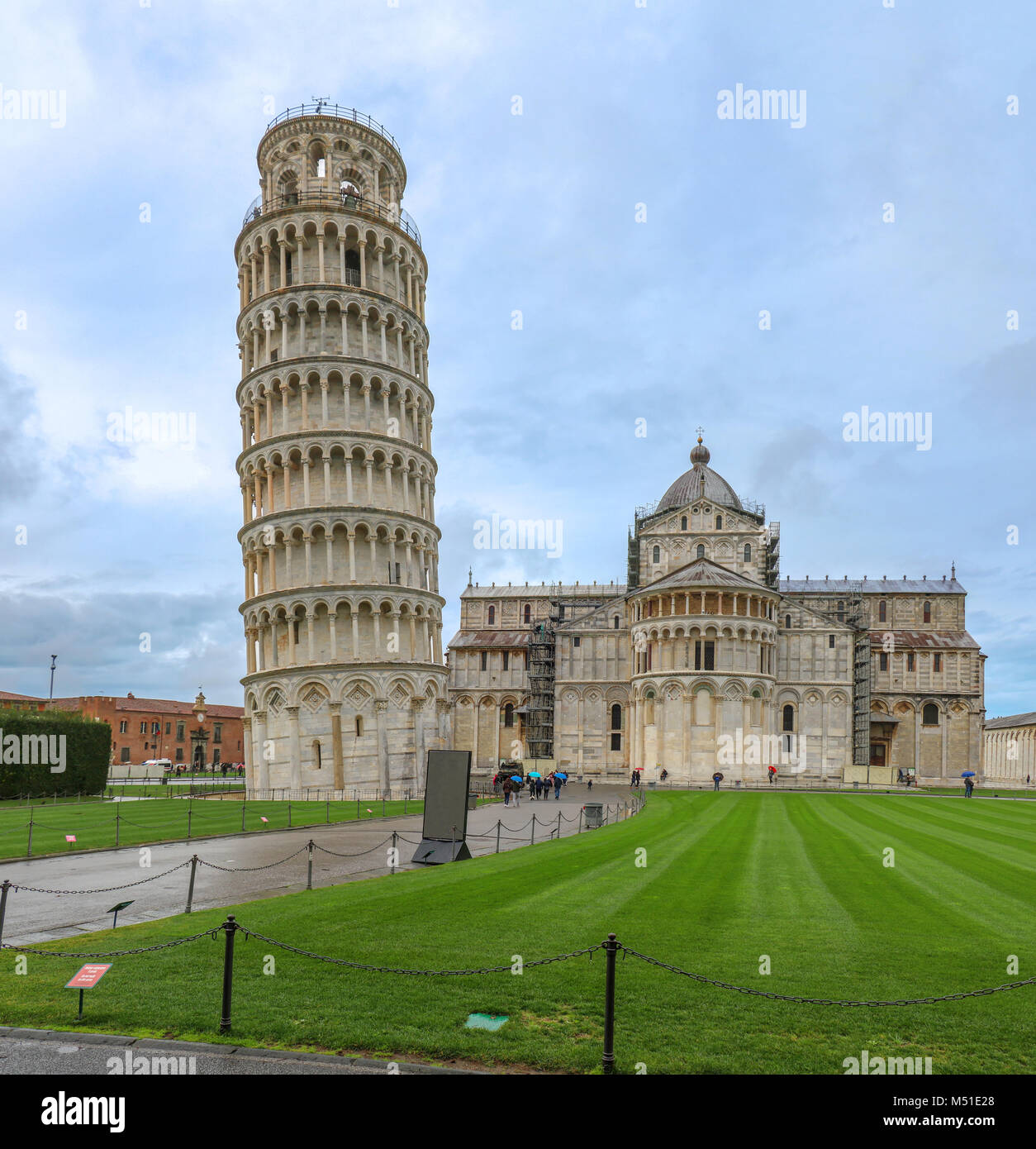 Famous Leaning Tower of Pisa next to cathedral in Italy Stock Photo - Alamy